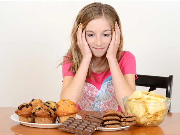 Signs Of Binge Eating In Children - Boldsky.com
