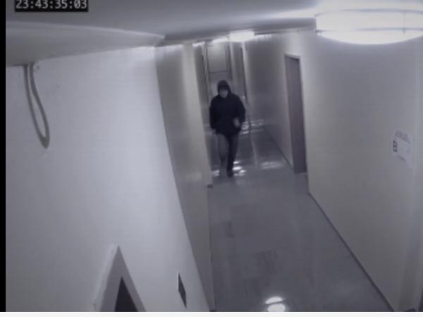 Security Camera Captures A Strange Figure Attacking A Man In A Hallway ...