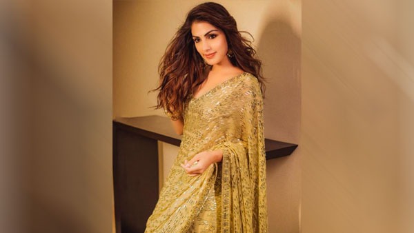 Rhea Chakraborty Looks Classy And Elegant In This Golden Sequin Saree ...